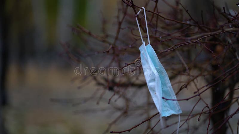 Used Disposable Face Mask in Puddle during Rain Stock Video - Video of ...