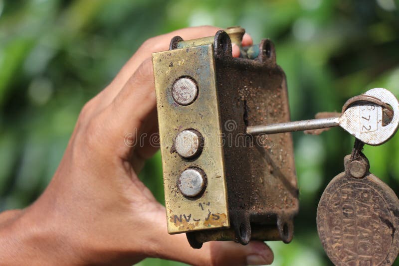 Used Door Lock with Double Lock System Held in Hand with Keys Stock ...
