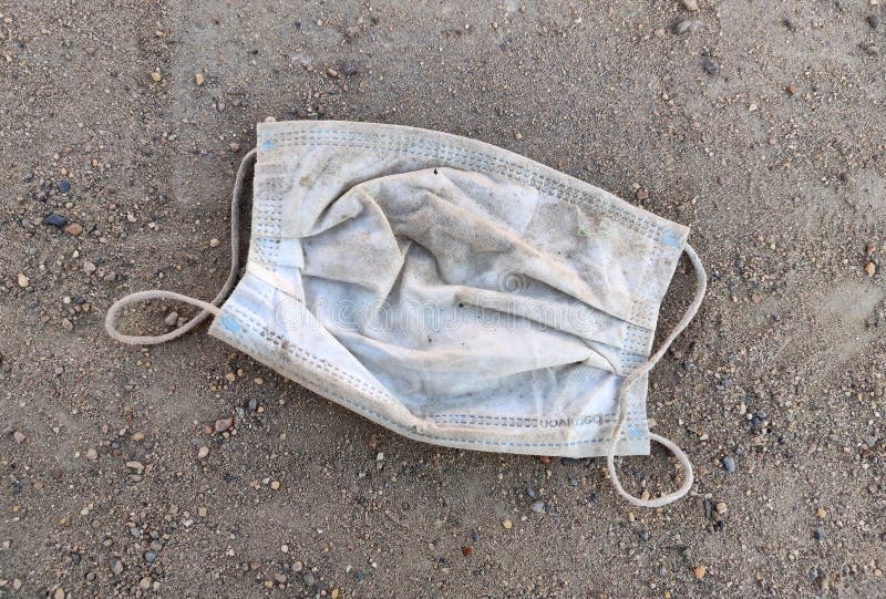 Used Face Mask on Ground stock photo. Image of ground - 240462852