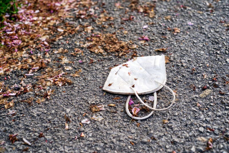 Used Face Mask on the Ground Stock Photo - Image of face, medical ...