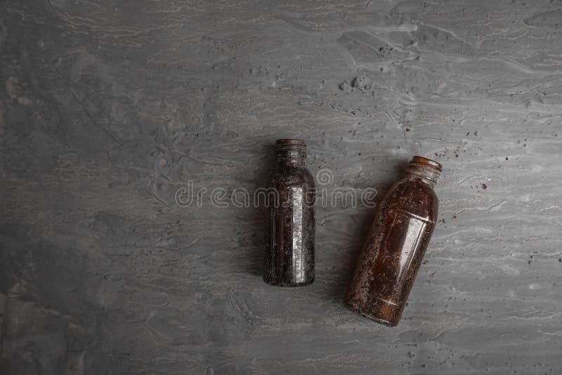 Used Glass Bottles on the Floor Stock Image - Image of floor, drawing ...