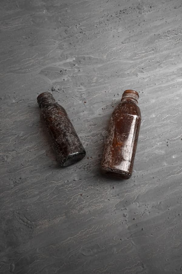 Used Glass Bottles on the Floor Stock Image - Image of brown, wall ...
