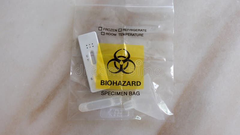 A Used Home Test Kit Sealed Inside the Biohazard Specimen Bag Stock ...