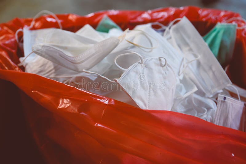 Used Infectious Masks in the Red Trash Bin, Preventing the Virus Covid ...