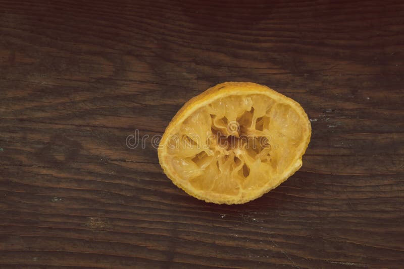 Used Lemon on Wood Background. Vintage Look Stock Photo - Image of ...
