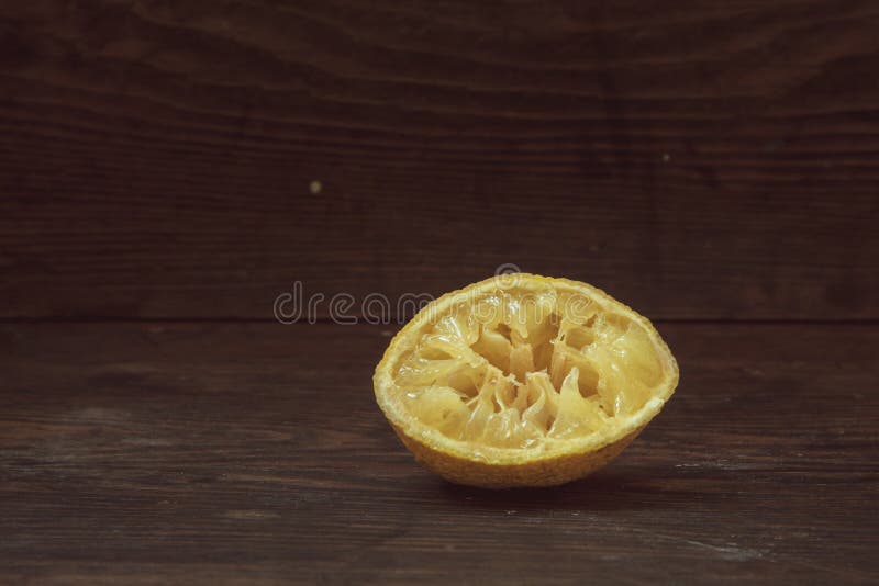 Used Lemon on Wood Background. Vintage Look Stock Photo - Image of ...