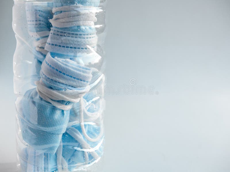 Used Mask Concept. Folded Used Protective Face Mask before Littering ...