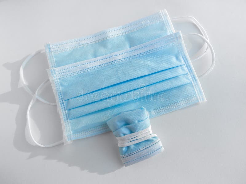 Used Mask Concept. Protective Face Mask and Folded Used Face Mask ...