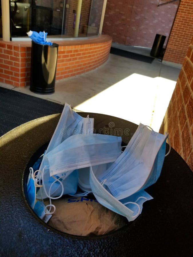 Used Masks in Garbage during COVID-19 Pandemic Stock Photo - Image of ...