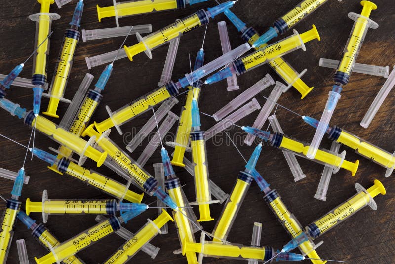 Used Medical Syringes on a Dark Stock Image - Image of caring, health ...