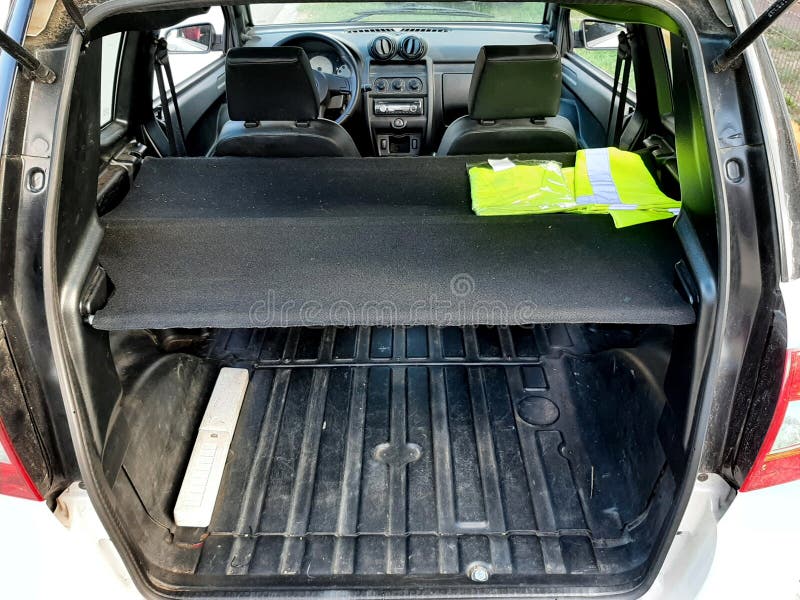 A Used Microcar Seen from the Back, with the Trunk Door Open Stock ...