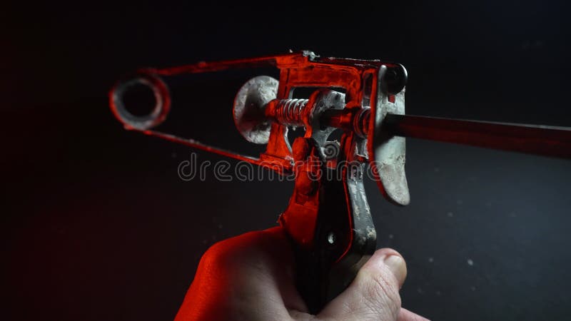 Assembly Gun for Sealants for Construction Work in Red Light Stock ...
