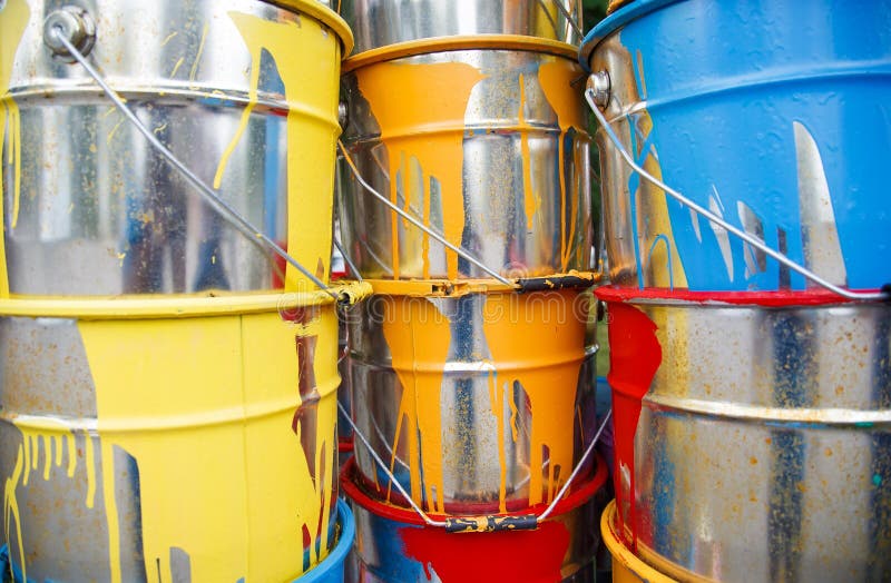 The Used Paint Cans. Many Multi-colored Buckets with Traces of Paint on ...