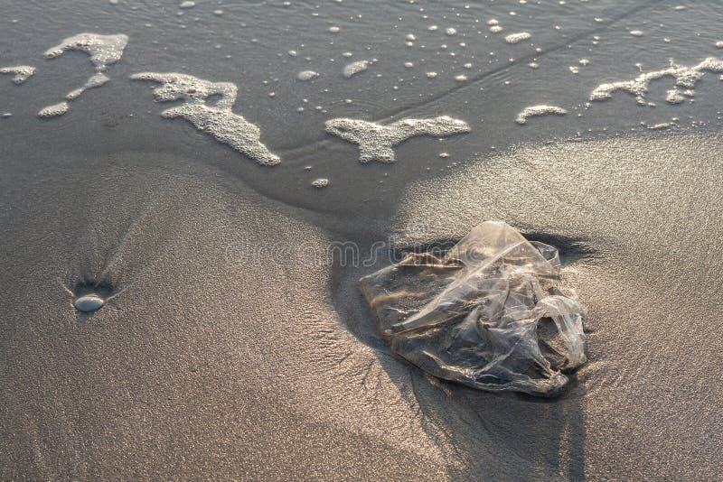 Used Plastic Bag Garbage on Sand Beach Stock Photo - Image of fall ...