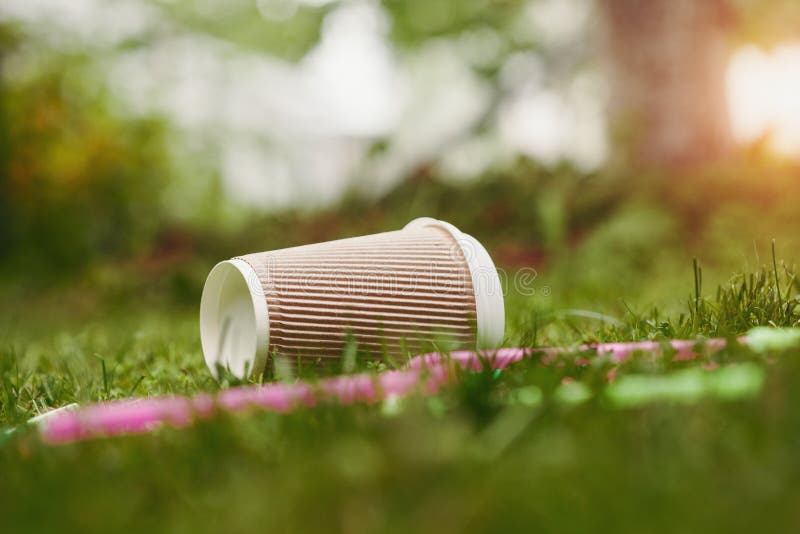Used Plastic Coffee Cup and Plastic Straw on Green Grass, Waste ...