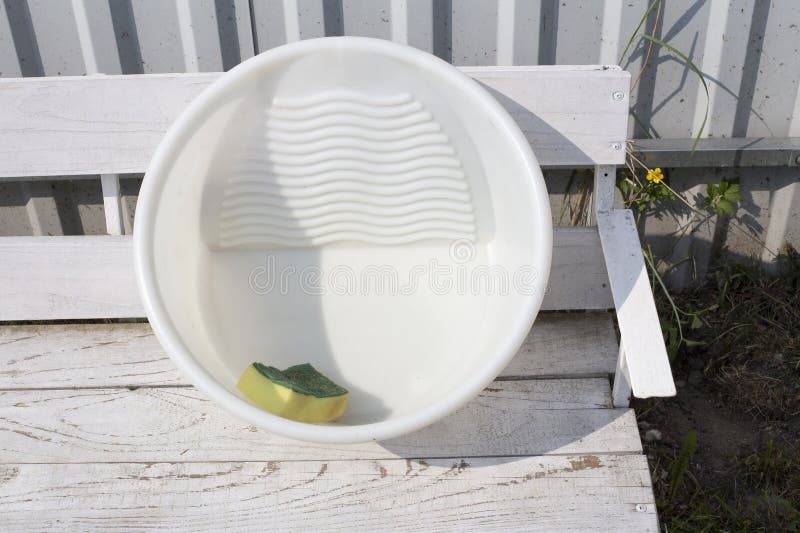 After Cleaning, the Basin Stands Outside on a Bench Stock Photo - Image ...