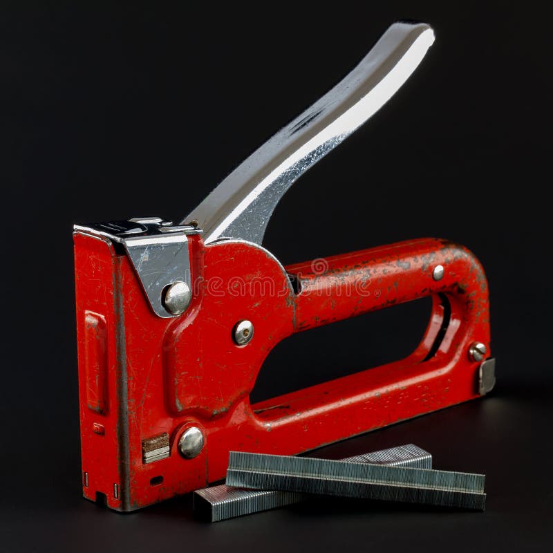 Used Staple Gun and Staples on Black Stock Photo - Image of stack ...