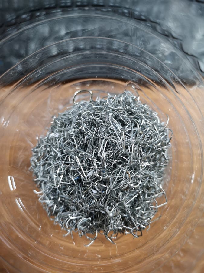 Used Staples Collected To Make Artificial Legs. Stock Image - Image of ...