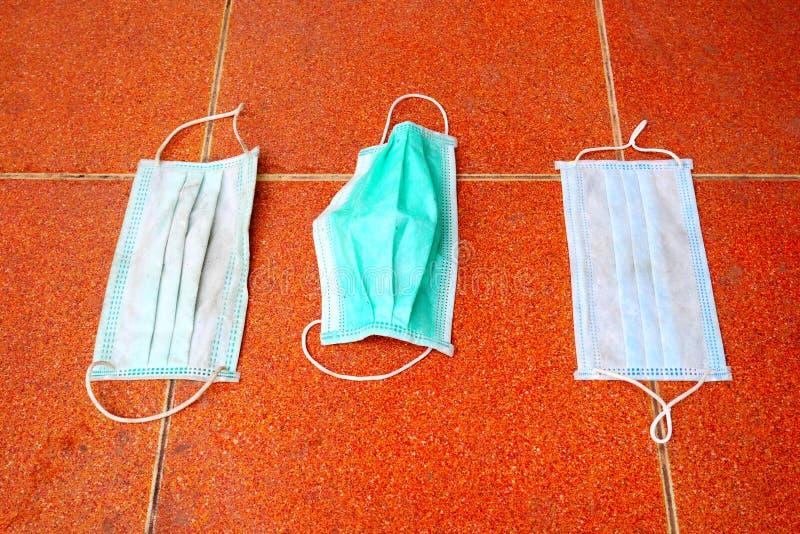 Used Surgical Mask on the Floor. Discarded Mask. the Mask that Was ...