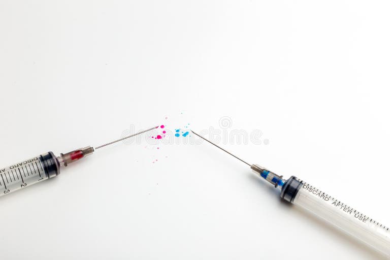Used Syringes with a Protective Cap on the Needle with Colored ...