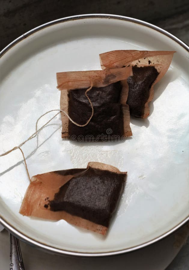 Used tea bags black tea stock image. Image of closeup - 226485351