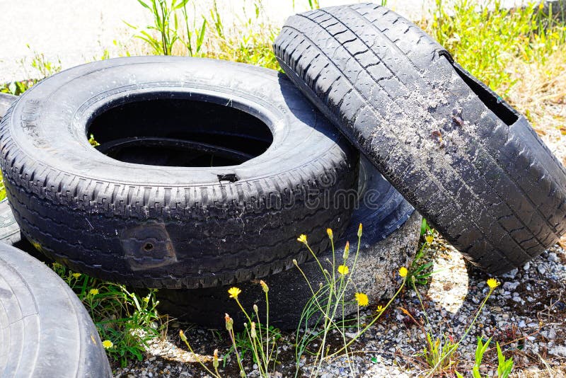 Used Tires Discarded in a Field Stock Photo - Image of garbage, tires ...