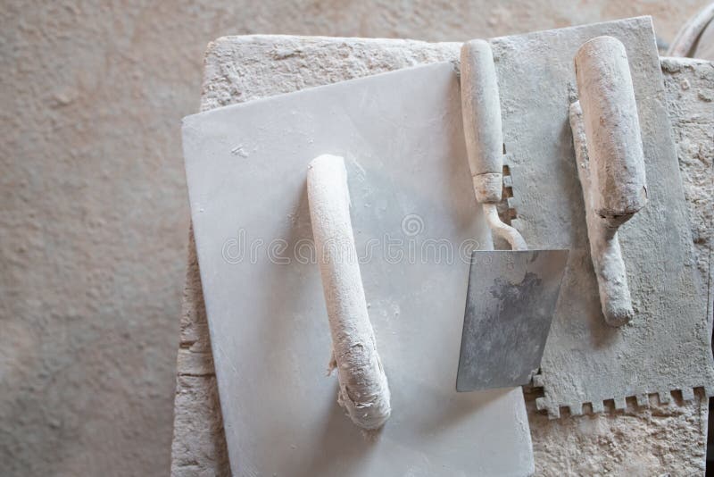 Used Tools for Bricklayers Lie on a Table. the Tool is White and Full ...