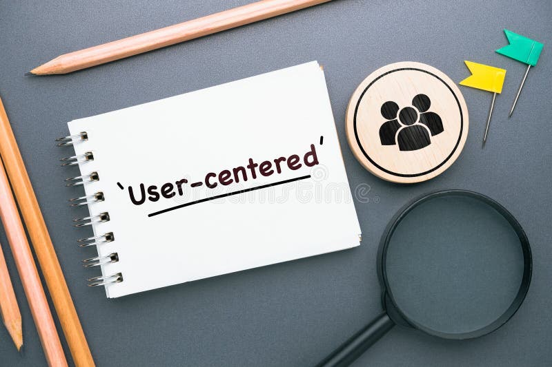 User-Centered Design Concept with Notebook and Icons Stock Photo ...