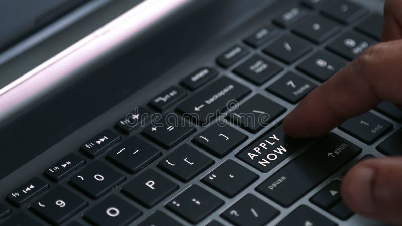 User Finger Press Laptop Keyboard Button with APPLY NOW Word. Stock ...