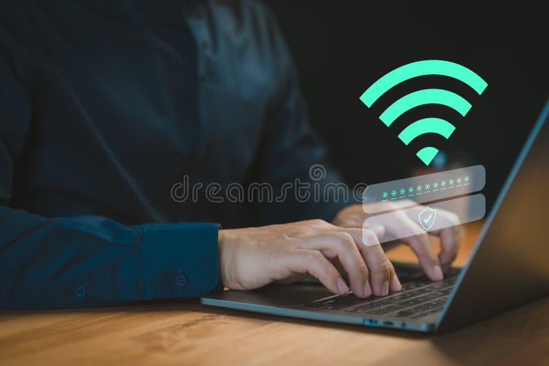 User Logs into a Laptop Computer Using a Wi-Fi Connection, Entering a ...