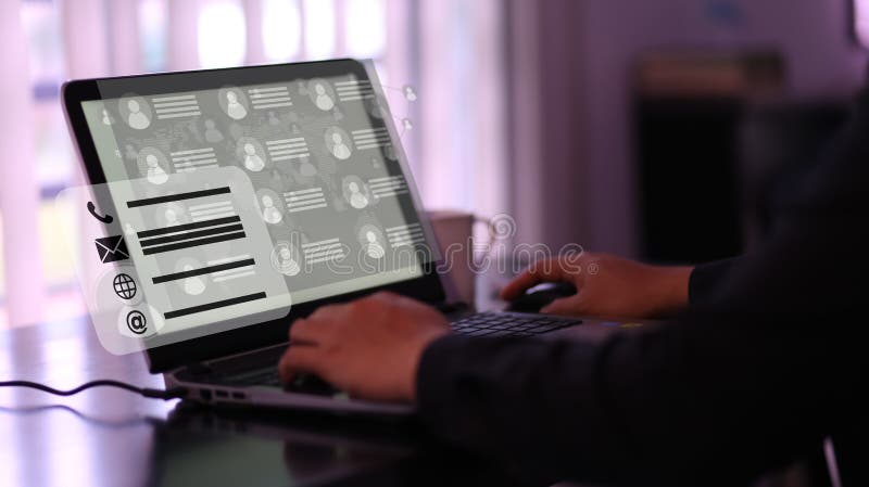 User Typing on a Laptop with Virtual Screen of Directory Contact. Stock ...