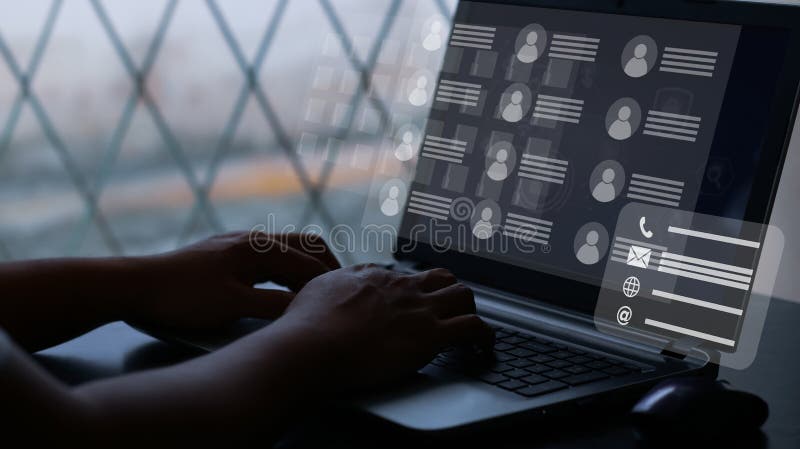 User Typing on a Laptop with Virtual Screen of Directory Contact. Stock ...
