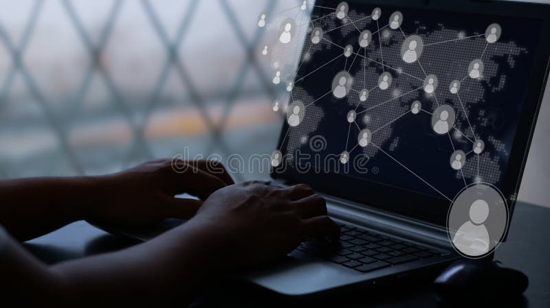 User Typing on a Laptop with Virtual Screen of Networking and Wold Map ...