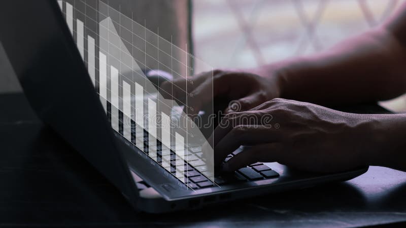 User Typing on a Laptop with Virtual Screen of Performance Graph ...