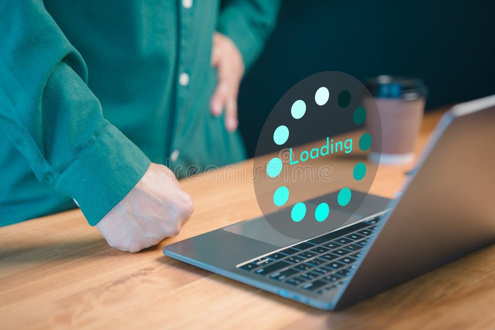 User Use a Laptop Computer To Download and Update Software with Waiting ...