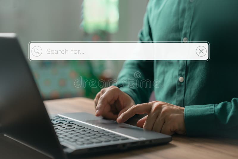User Working with a Laptop Computer on the Table. Search Engine ...