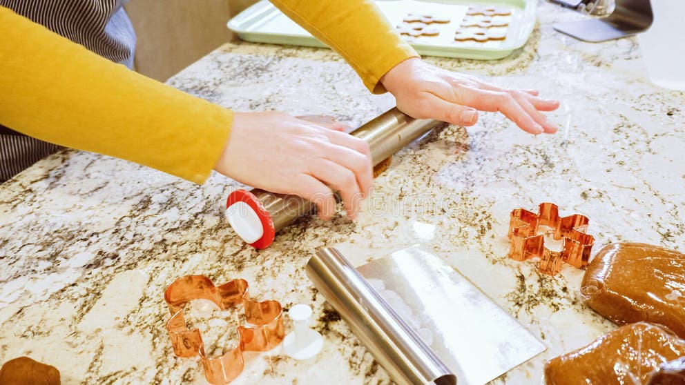 Baking Christmas Gingerbread Cookies in a Modern Kitchen Stock Photo ...