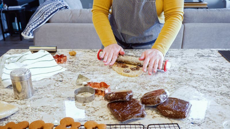 Baking Christmas Gingerbread Cookies in a Modern Kitchen Stock Photo ...