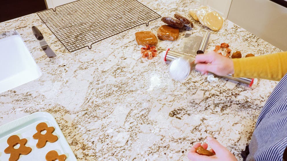 Baking Christmas Gingerbread Cookies in a Modern Kitchen Stock Photo ...