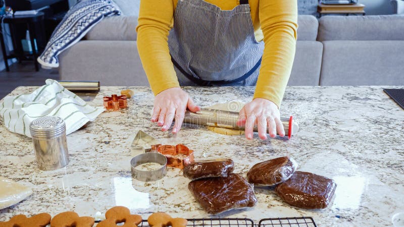 Baking Christmas Gingerbread Cookies in a Modern Kitchen Stock Photo ...
