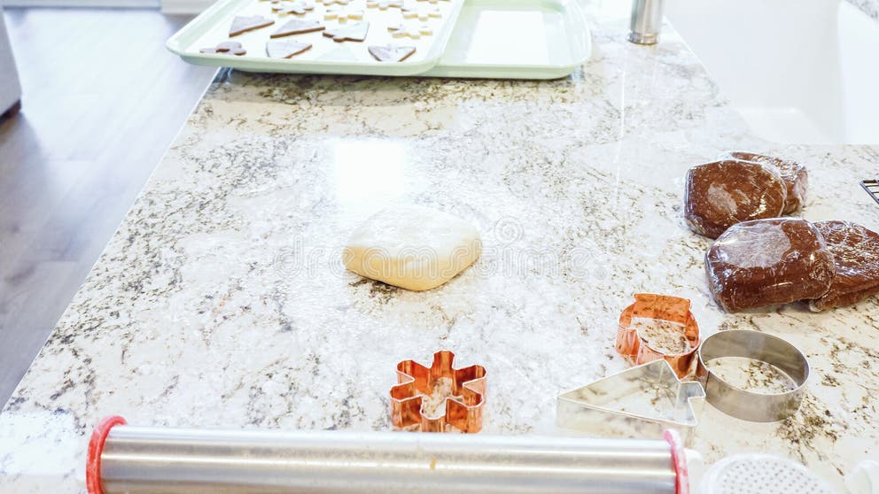 Baking Christmas Gingerbread Cookies in a Modern Kitchen Stock Photo ...
