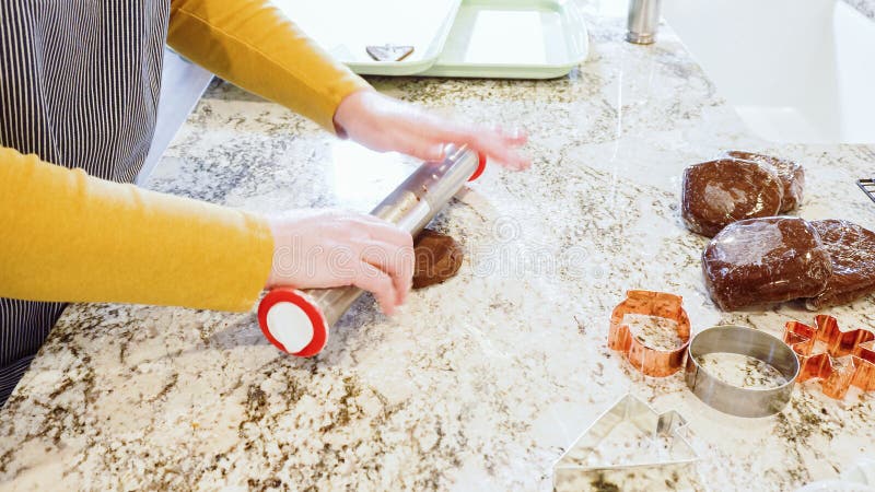Baking Christmas Gingerbread Cookies in a Modern Kitchen Stock Photo ...