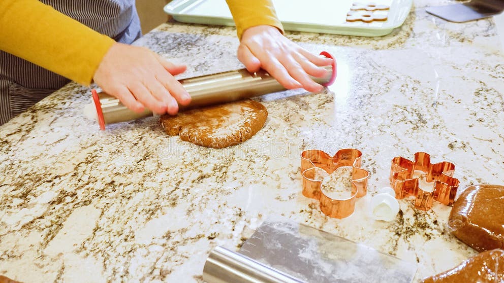 Baking Christmas Gingerbread Cookies in a Modern Kitchen Stock Photo ...
