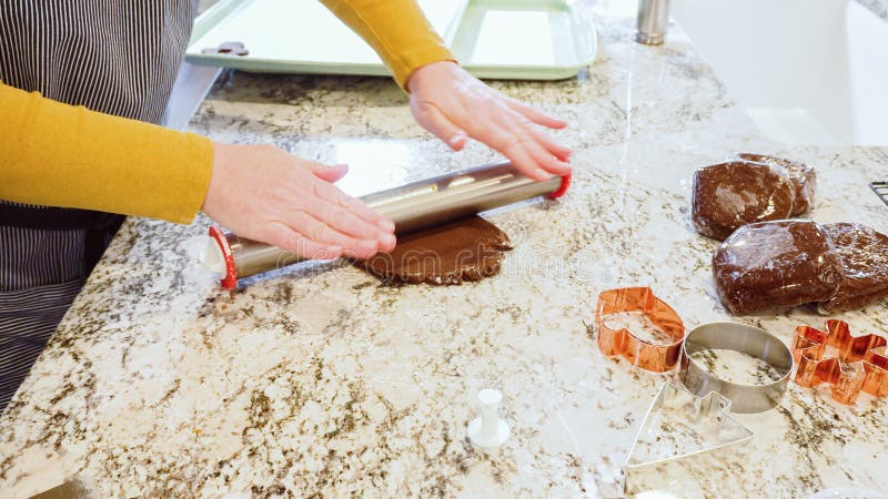 Baking Christmas Gingerbread Cookies in a Modern Kitchen Stock Photo ...