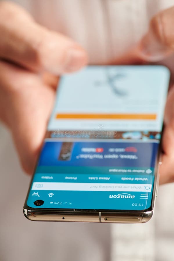 Using amazon mobile app editorial stock photo. Image of mobile - 153929303