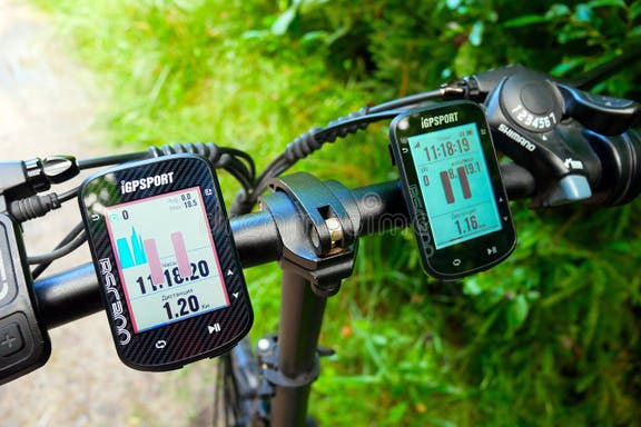 Using a Bicycle Computer. Bicycle Computer for Cycling Editorial Photo ...