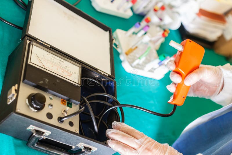Using a Biothesiometer stock photo. Image of thesiometer - 42043720
