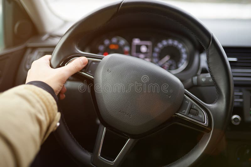 Using buttons on car wheel stock photo. Image of business - 106164796