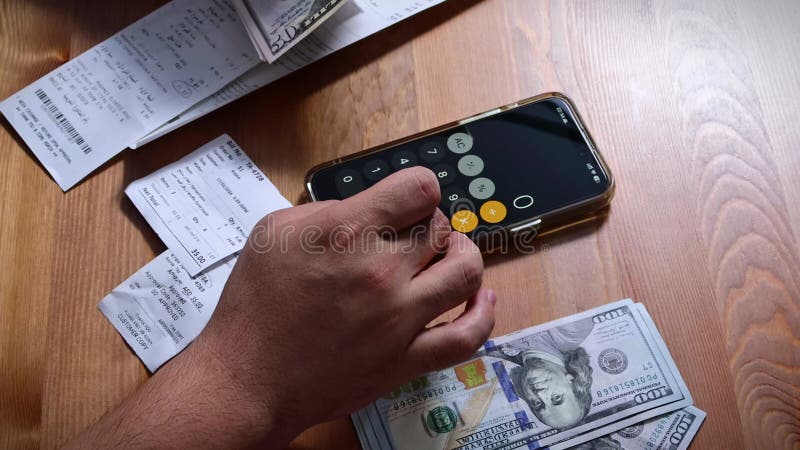Using a Calculator To Add Up Bills with Precise Finger Gestures Stock ...