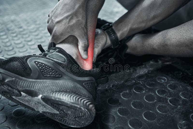 Using Cgi To Find Pain. Closeup on Hand of a Trainer Touching a ...
